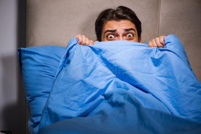 The Young Man Scared in Bed Stock Image - Image of face, morning: 89097079