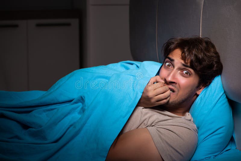 Man Scared In Bed