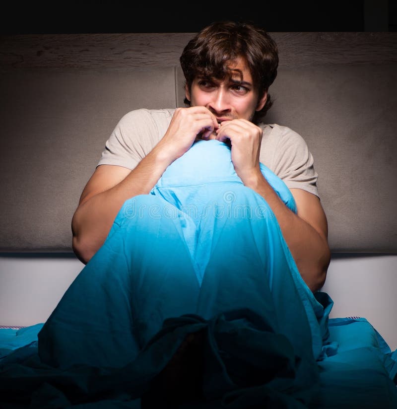 Young Man Scared in His Bed Having Nightmares Stock Photo - Image of male, dream: 332193260