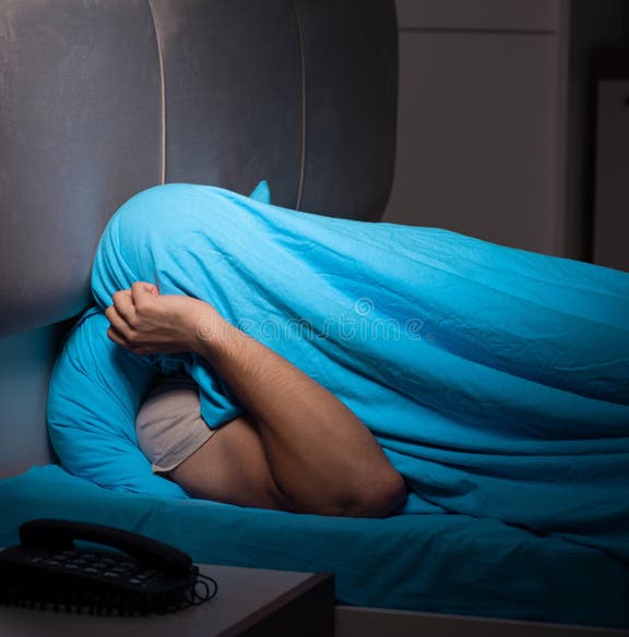 Young Man Scared in His Bed Having Nightmares Stock Image - Image of ...