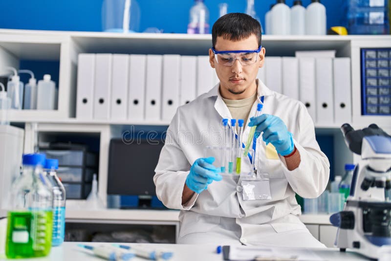 Young Man Scientist Holding Test Tubes at Laboratory Stock Image ...