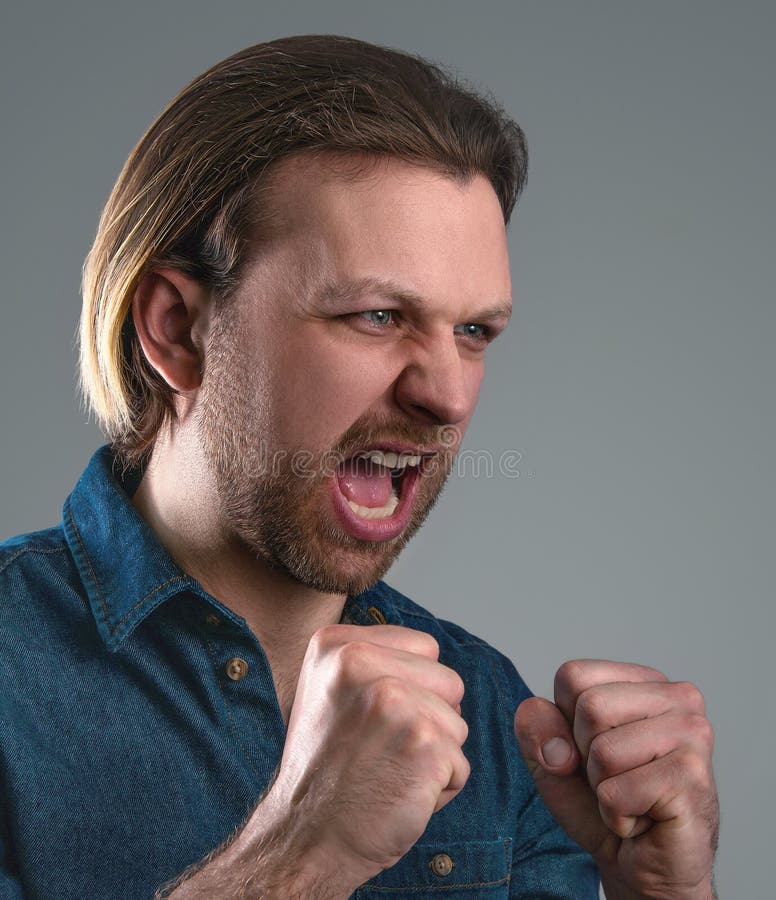 Young man screaming. stock image. Image of style, shirt - 77409419