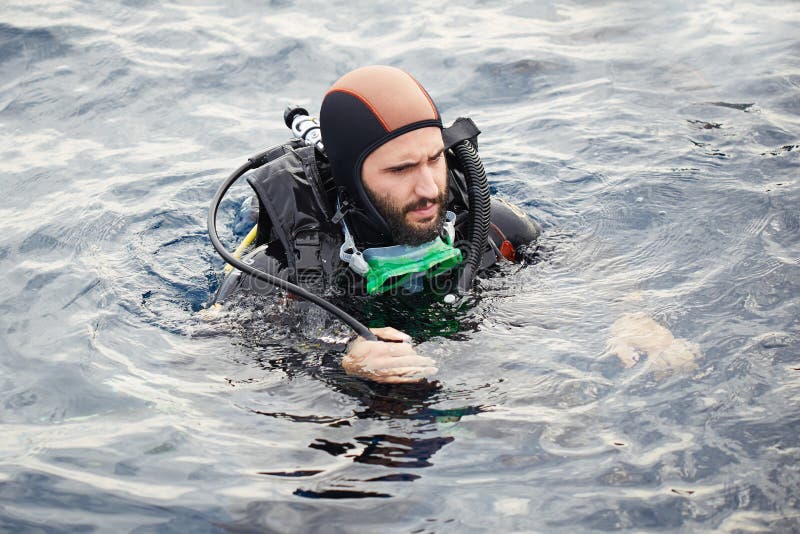 Young man scuba diving stock image. Image of training - 33342219