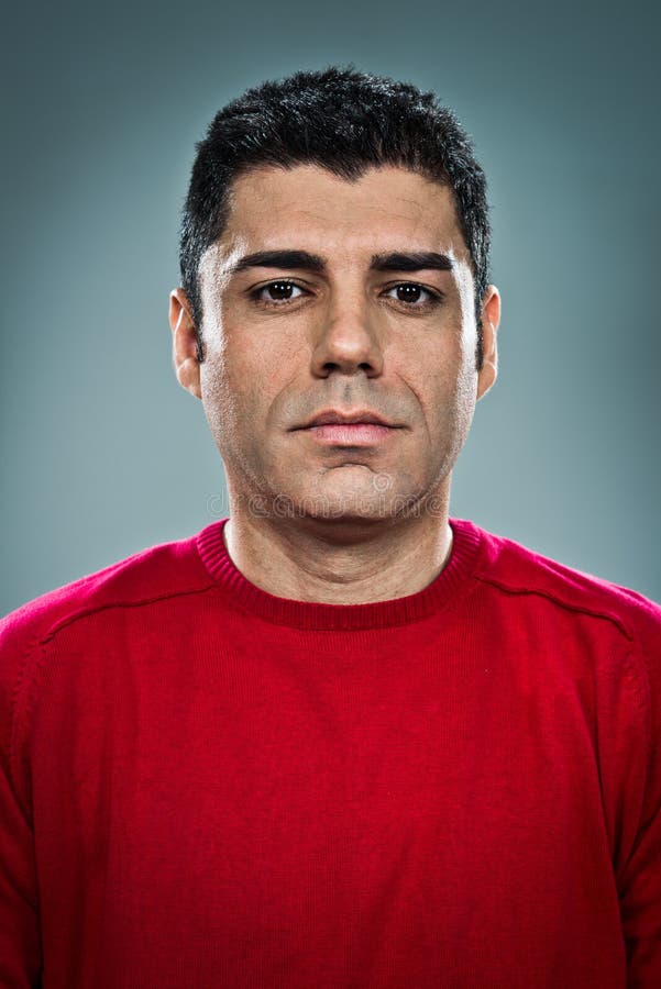 Young Man with Serious Expression Stock Photo - Image of portrait ...