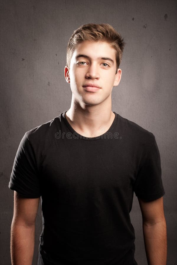 Young Man with Serious Expression Stock Image - Image of people, person ...