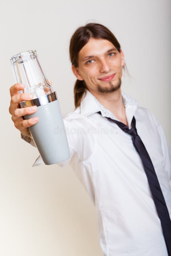 Young Man with Shaker Making Cocktail Drink Stock Photo - Image of ...