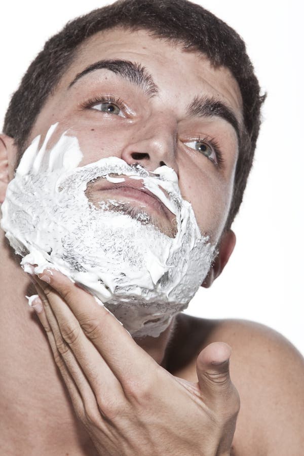Young man shaving stock photo. Image of shave, bathroom - 10855904