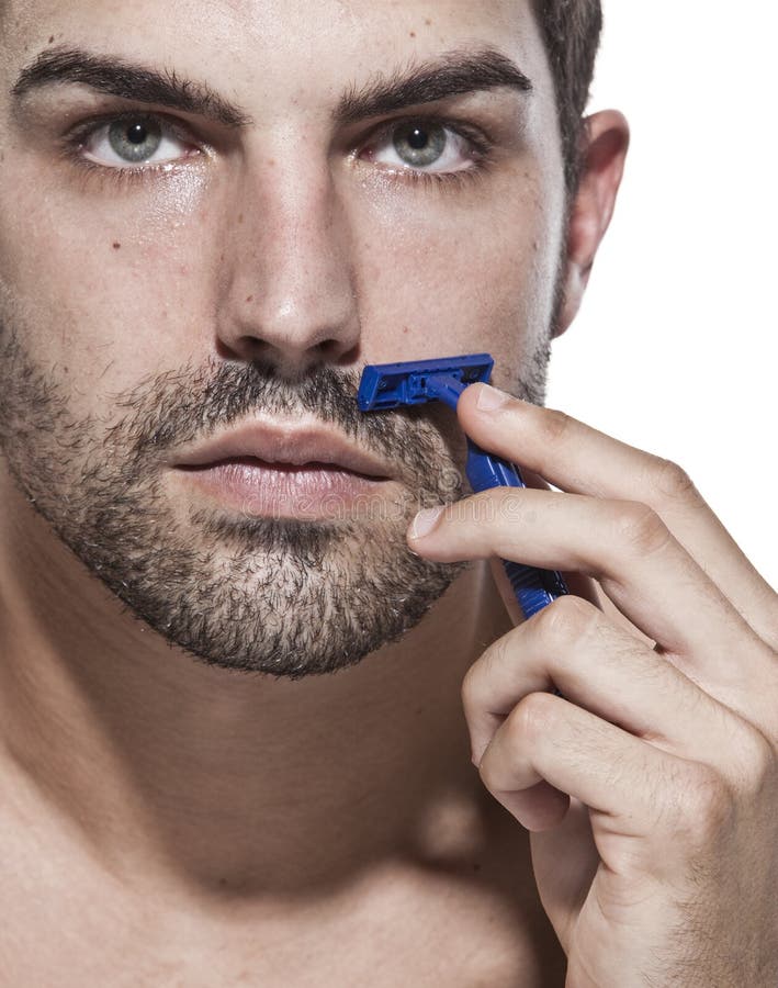 Young man shaving stock photo. Image of indoors, grooming - 10856344