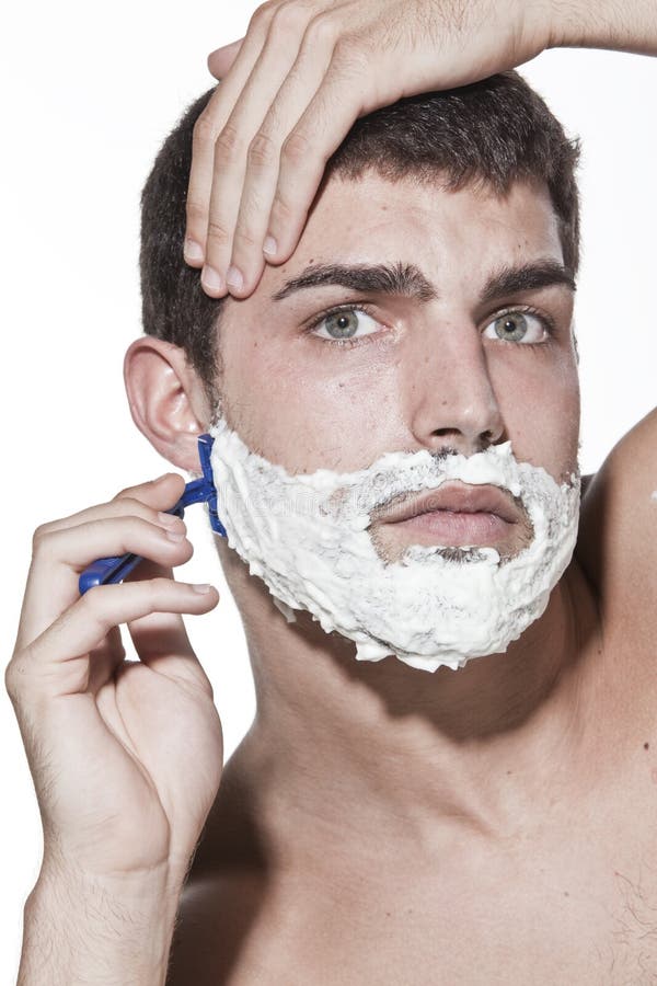 Young man shaving stock image. Image of years, adult - 10871031