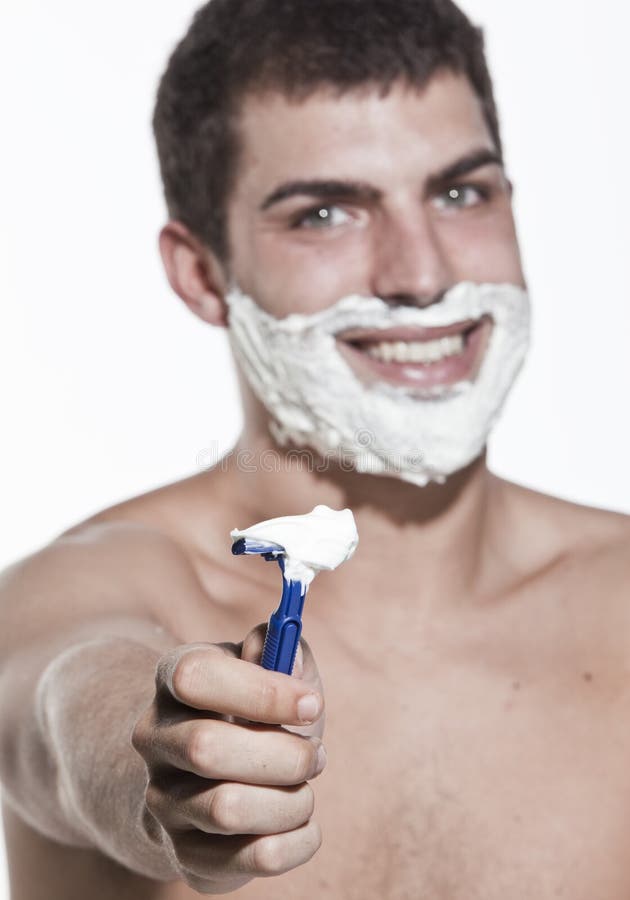 Young man shaving stock image. Image of person, foam - 10871053