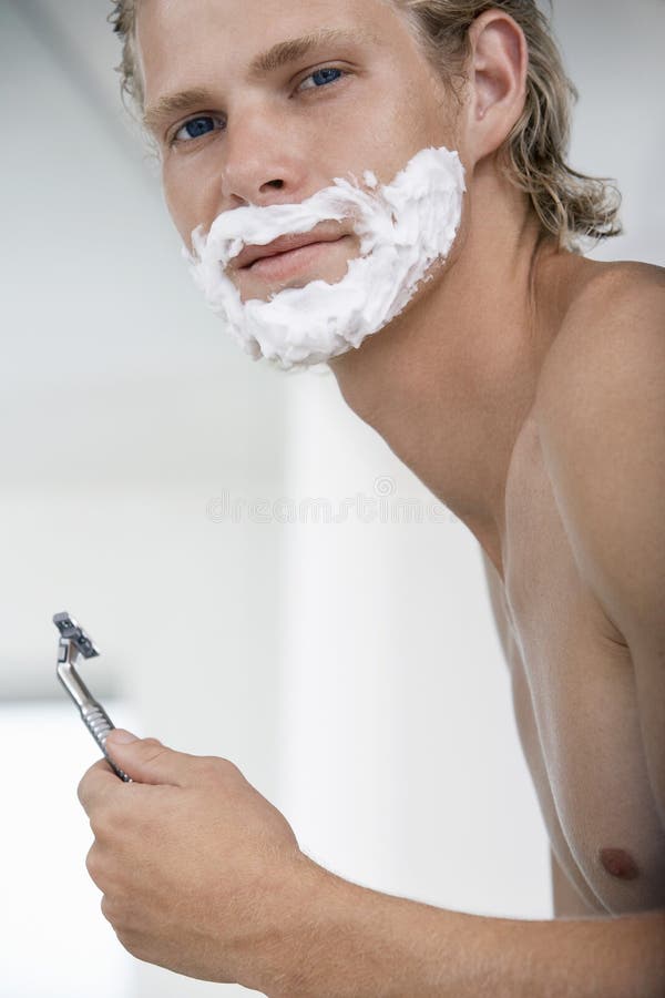 Young Man Shaving stock photo. Image of foam, person - 29657732