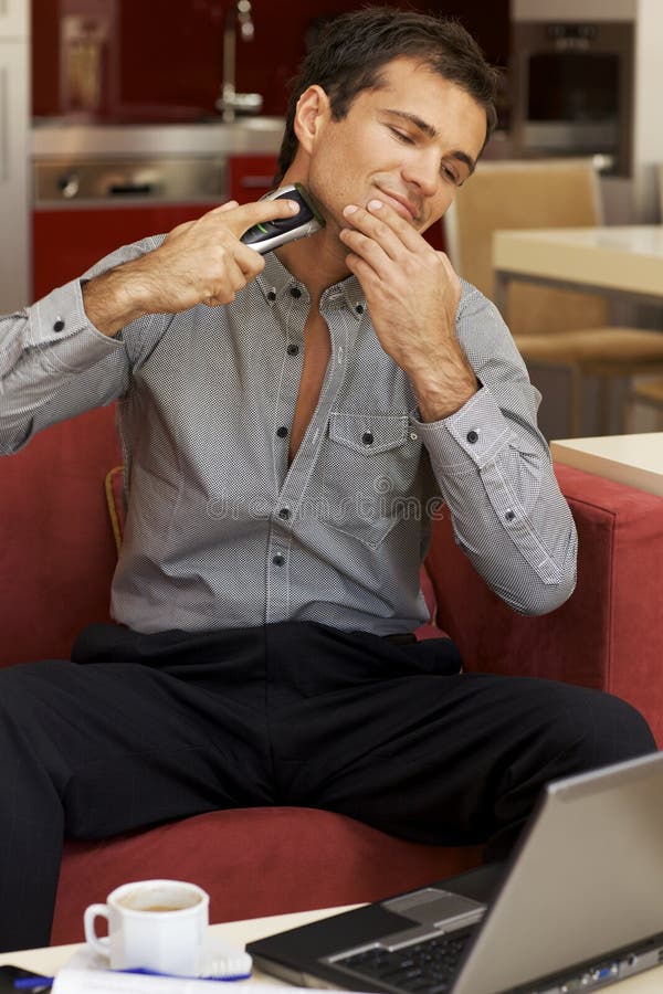 Shaving by electric shaver stock photo. Image of life - 21757182