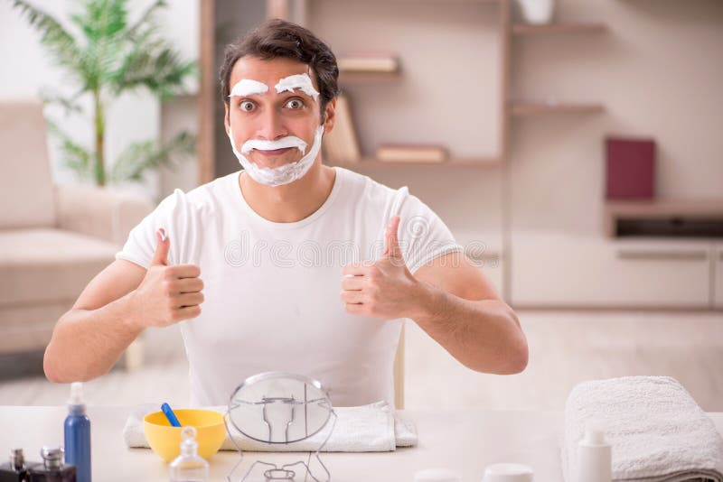 Young Man Shaving Face at Home Stock Image - Image of male, metrosexual ...