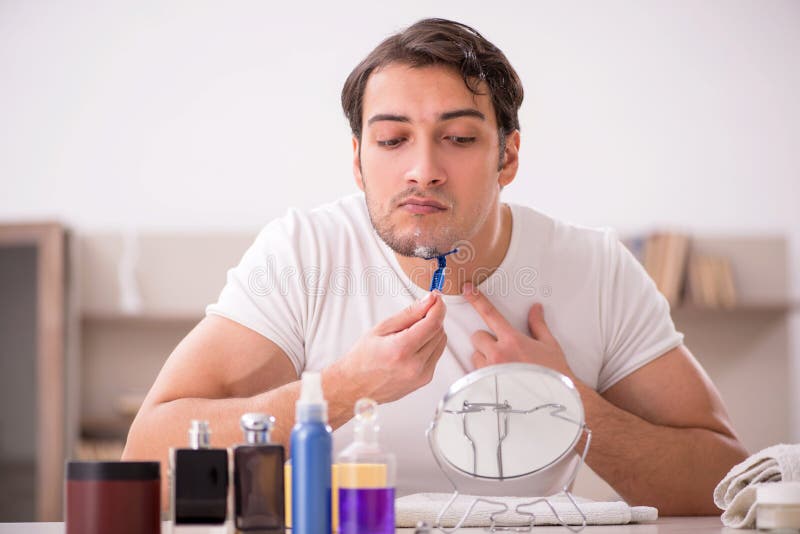 Young Man Shaving Face at Home Stock Image - Image of bathroom, home ...