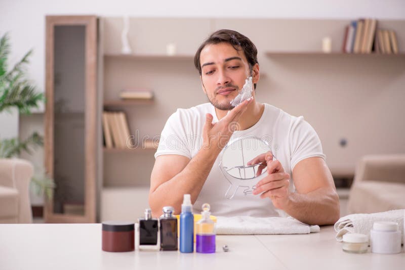Young Man Shaving Face at Home Stock Image - Image of model ...