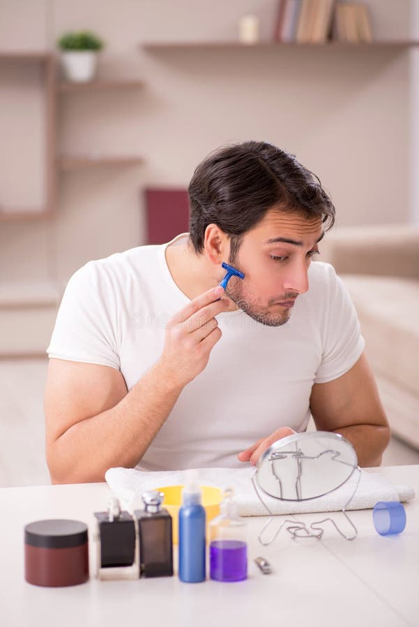 Young Man Shaving Face at Home Stock Image - Image of beauty ...
