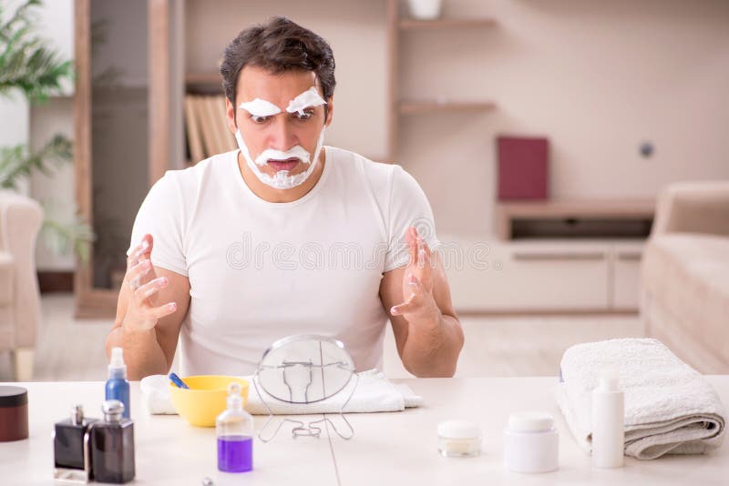 Young Man Shaving Face at Home Stock Photo - Image of grooming, beard ...