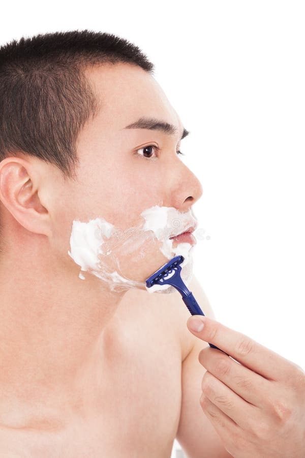 Young man with shaving stock photo. Image of isolated - 31696294