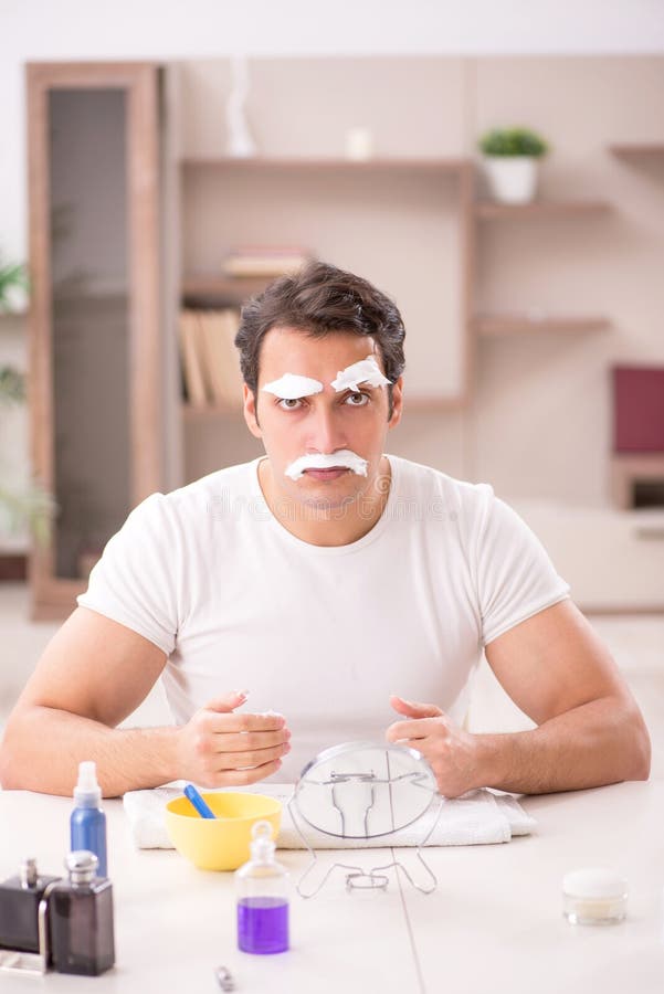 Young Man Shaving Face at Home Stock Photo - Image of shaving, face ...