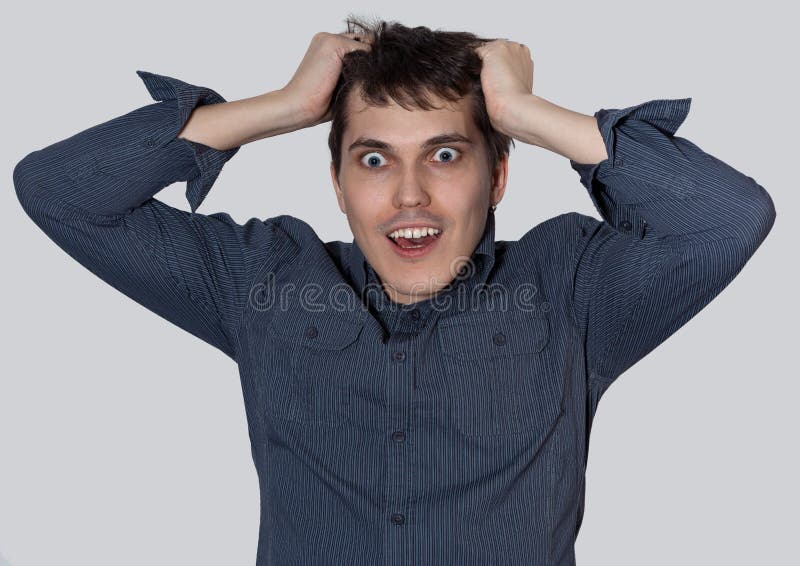 Young man in shock stock photo. Image of expressing, guilt - 49342296
