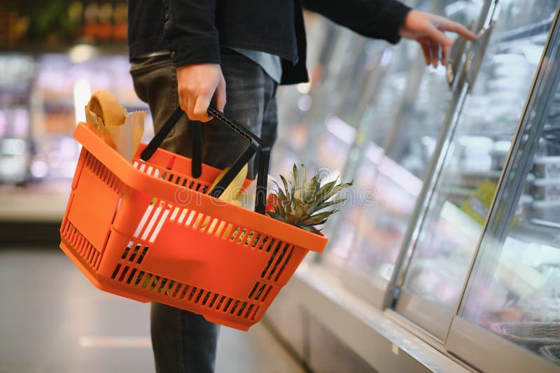 Young Man Shopping in Grocery Store. Shopping Concept Stock Photo ...