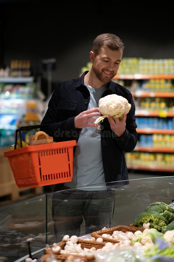 Young Man Shopping in Grocery Store. Shopping Concept Stock Photo ...