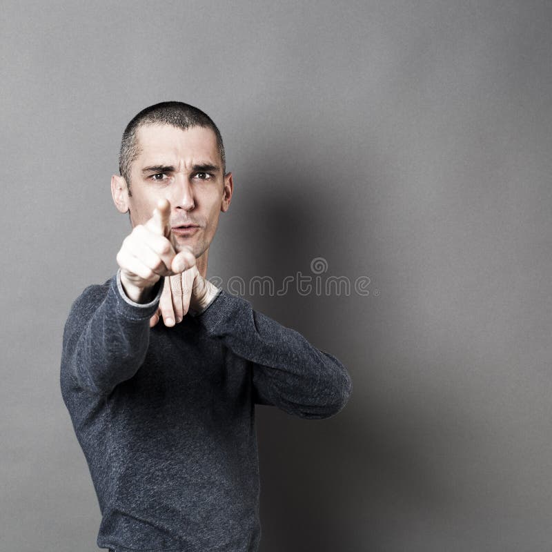Young Man with Short Hair Accusing or Denouncing Someone Stock Photo ...