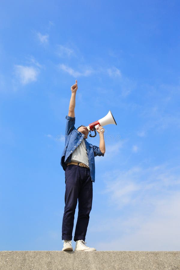 Young man shout megaphone stock photo. Image of people - 52344870