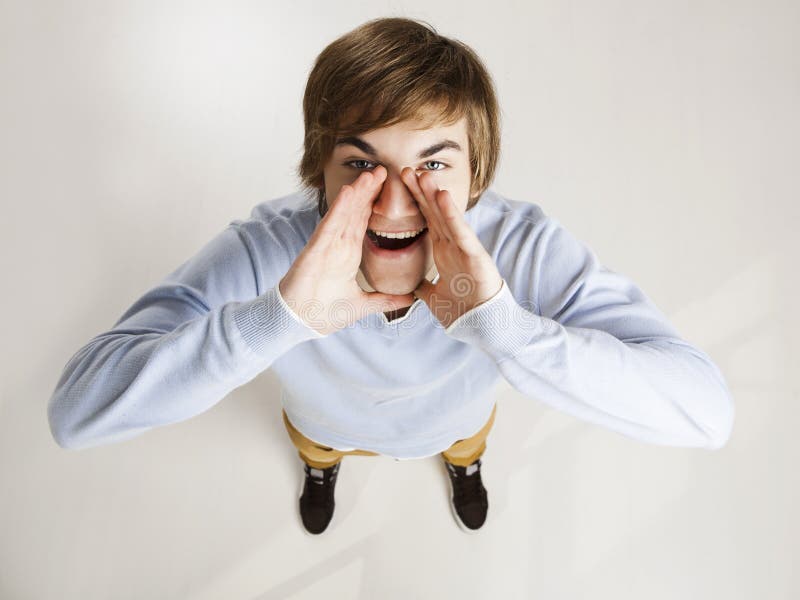 Young man shouting stock image. Image of expressive, person - 23323399