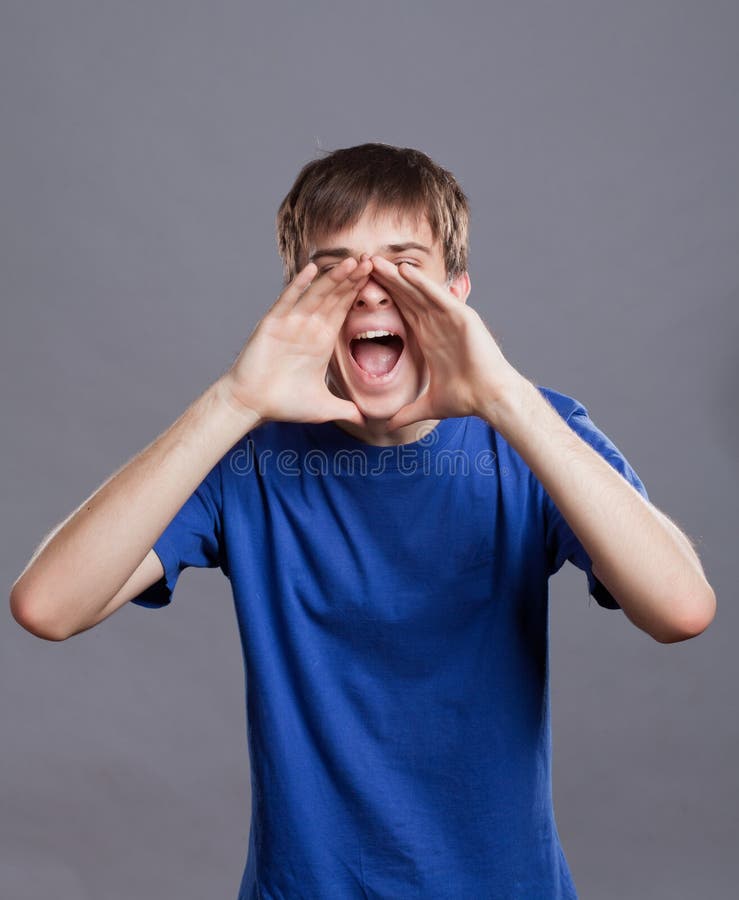 Young Man Shouting Attaching Stock Image - Image of shouting, human ...