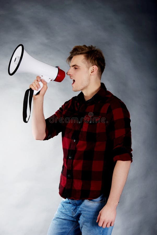 Young Man Shouting in Megaphone. Stock Image - Image of excited ...