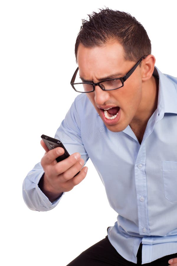 Angry Young Man Looking at His Mobile Phone Stock Image - Image of ...