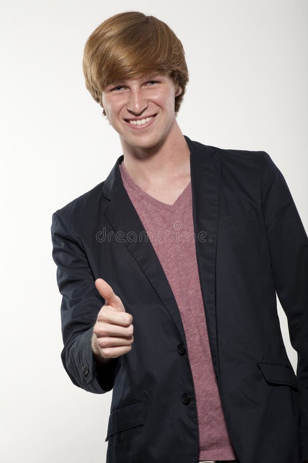 Young Man Showing Approval stock image. Image of gesturing - 20308077