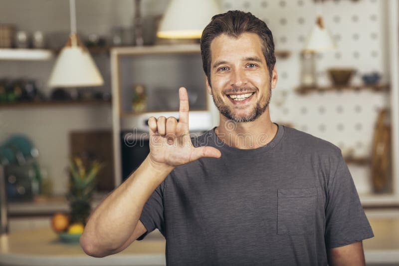 Man Showing Gesture in Sign Language Stock Photo - Image of audiology ...