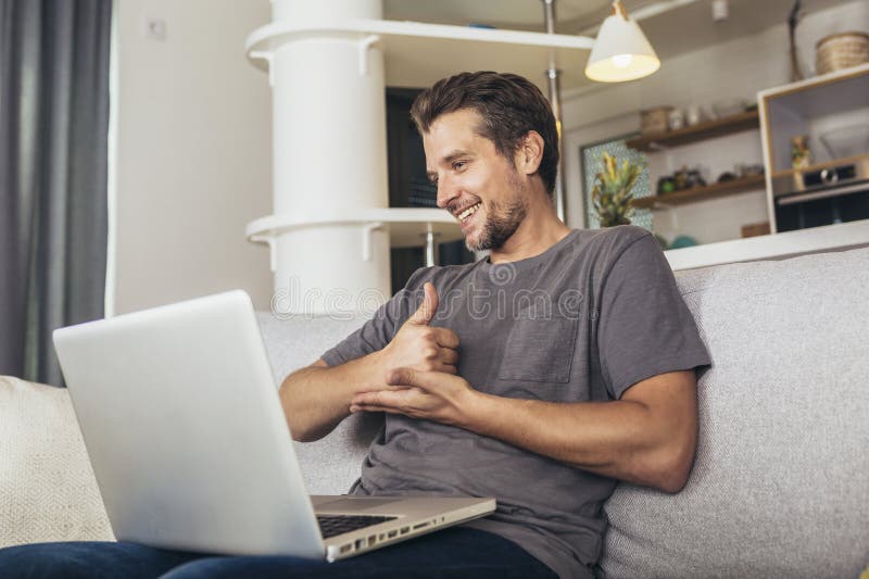 Man Showing Gesture in Sign Language Using Laptop, Make Video Call ...