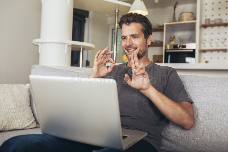 Man Showing Gesture in Sign Language Using Laptop, Make Video Call ...