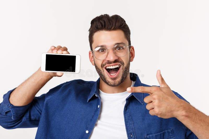 Young Man Showing His Brand New Smart Phone Isolated On White Stock