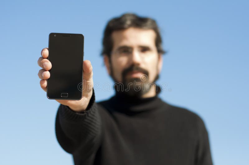 Young Man Showing His Mobile Phone Stock Photo - Image of investigation ...