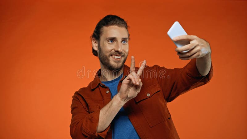 Young Man Showing Peace Sign while Stock Image - Image of casual ...