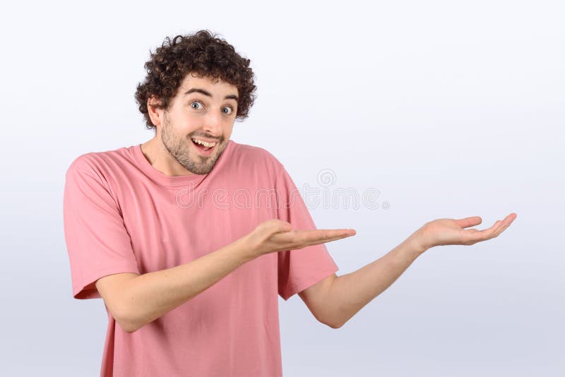 Young Man Showing Something Stock Image - Image of attractive, camera ...