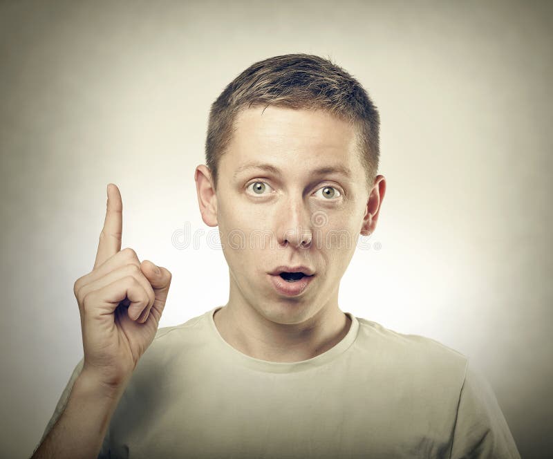 Young Man Showing Upwards Index Finger Stock Photo - Image of model ...