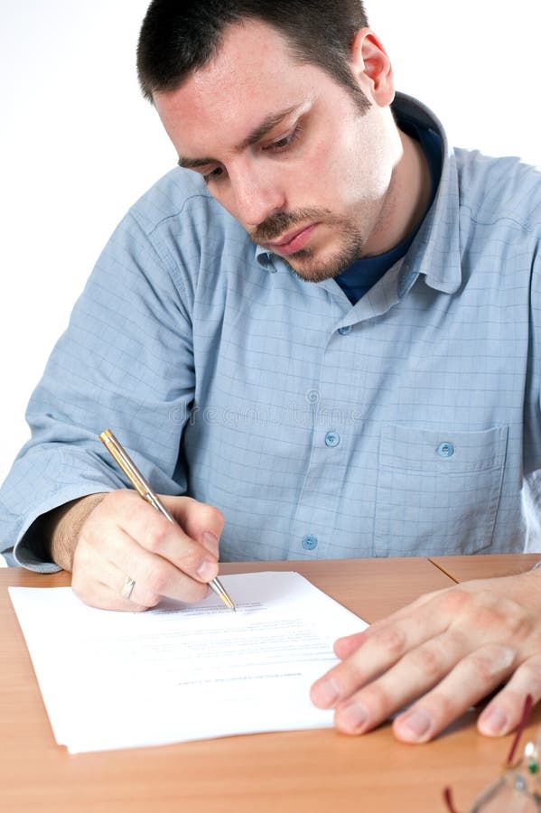 Young Man Signing Contracts Stock Image - Image of paper, books: 13541375