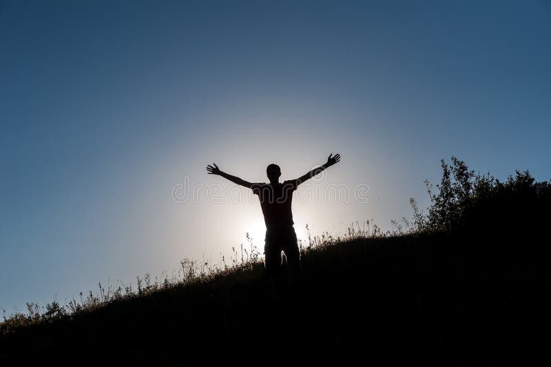 Young man silhouette joy stock image. Image of hillside - 44393923