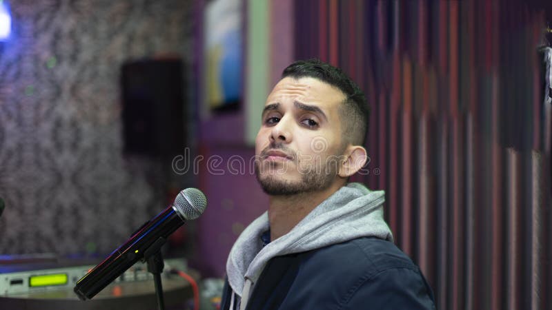 Young man singer arabian stock photo. Image of arabian - 265634478