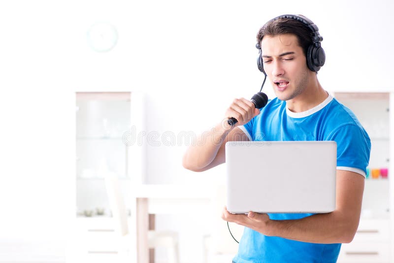 The Young Man Singing at Home Karaoke Stock Photo - Image of leisure ...