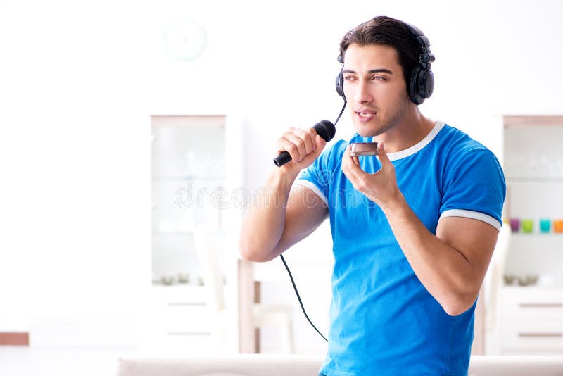 The Young Man Singing at Home Karaoke Stock Image - Image of musical ...