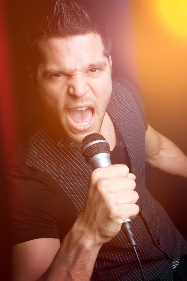 Young Man Singing stock image. Image of holding, entertainment - 77168033