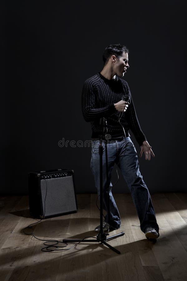 Man Singing Close To Adoring Fans Stock Photo - Image of enjoyment ...