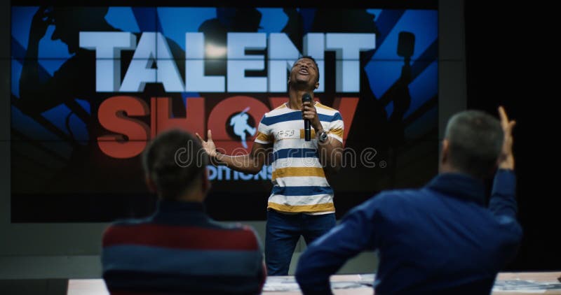 Young Man Singing at Talent Show Stock Image - Image of ambition ...