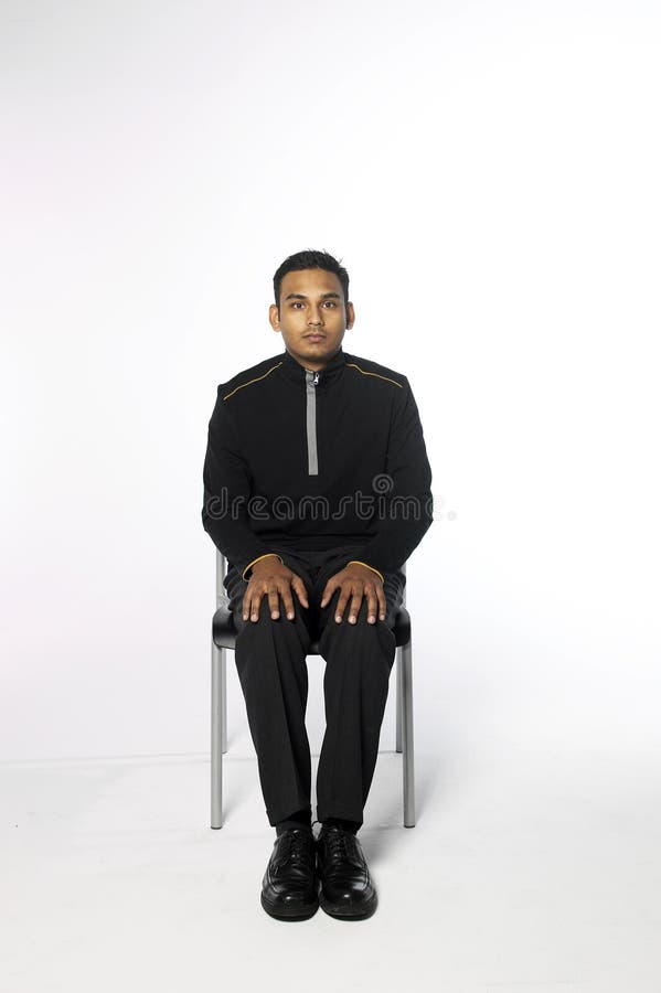 Young man sitting stock image. Image of urban, black, professional ...